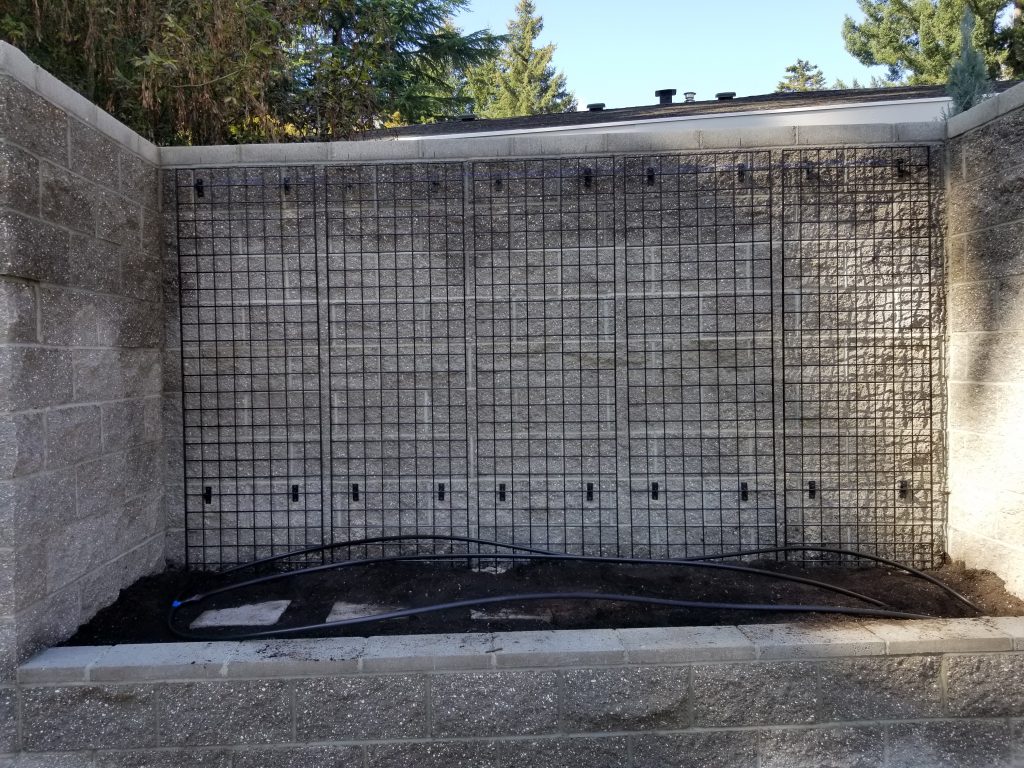 Trellis installation on concrete brick - Hedgehog Home Services, LLC
